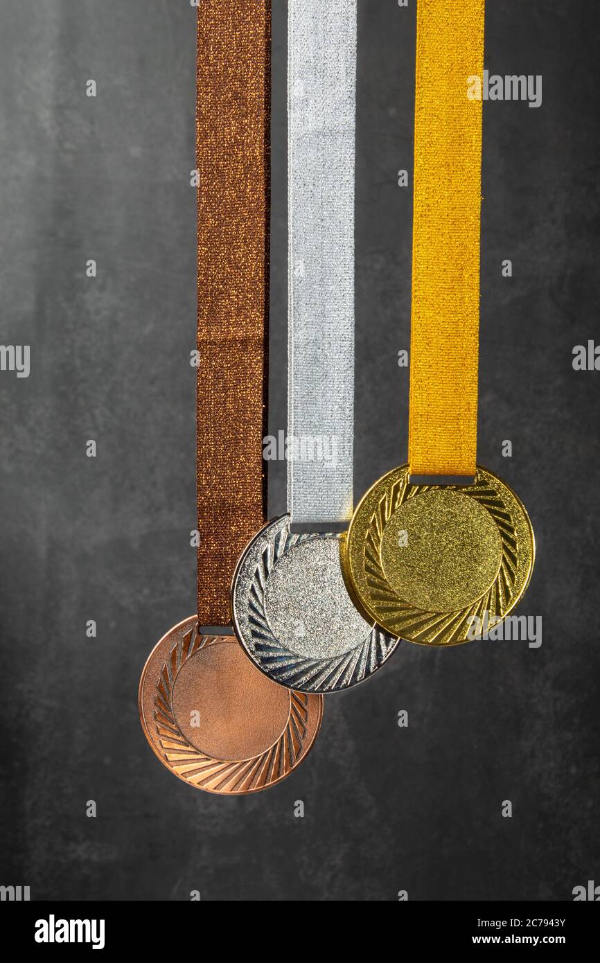 Gold medal, silver medal and bronze medal concept for winning or ...