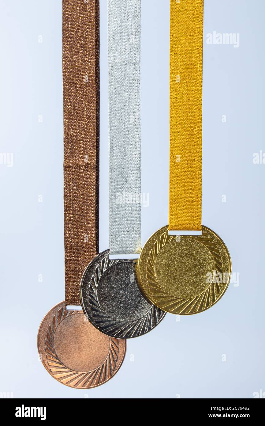 Gold medal, silver medal and bronze medal concept for winning or ...