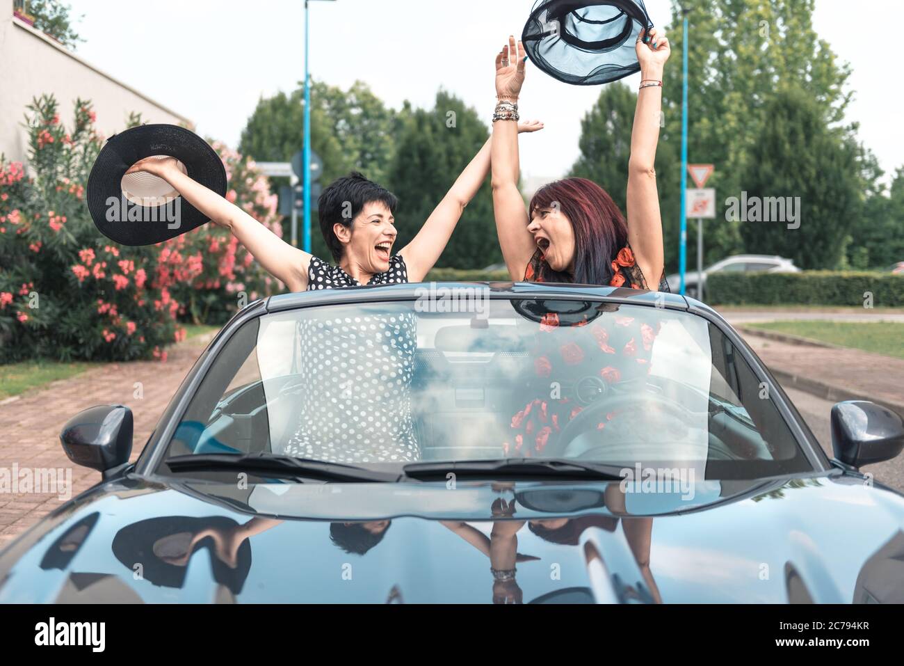 Two women driving car hi-res stock photography and images - Alamy