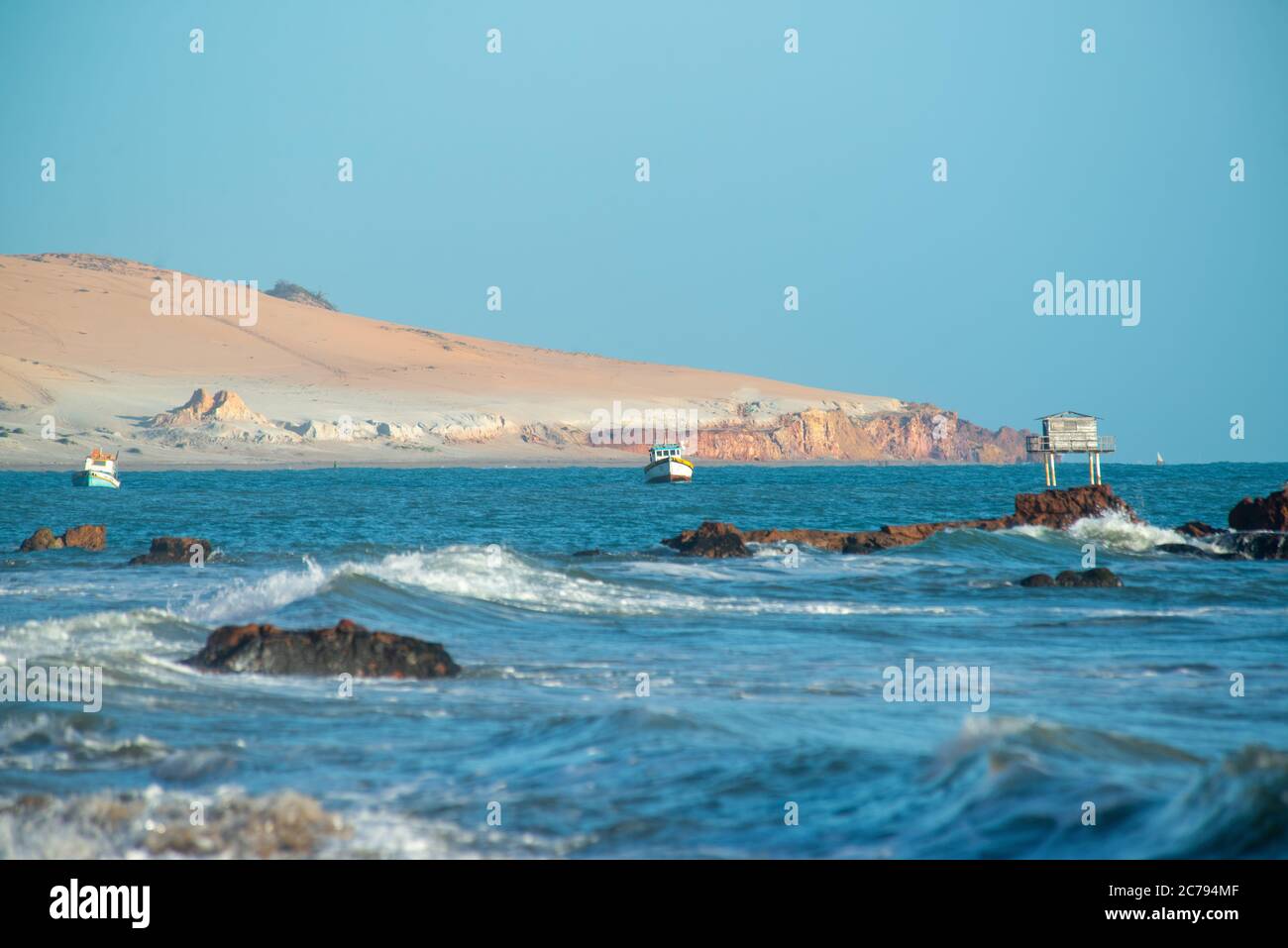 Early morning view of Praia de Peroba, Icapui, Ceará, Brazil with small ...