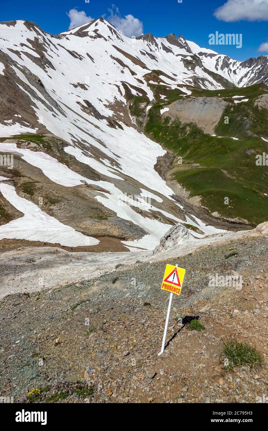 Warning sign of steep slope Col du Galibier, a high pass in the Ecrins ...