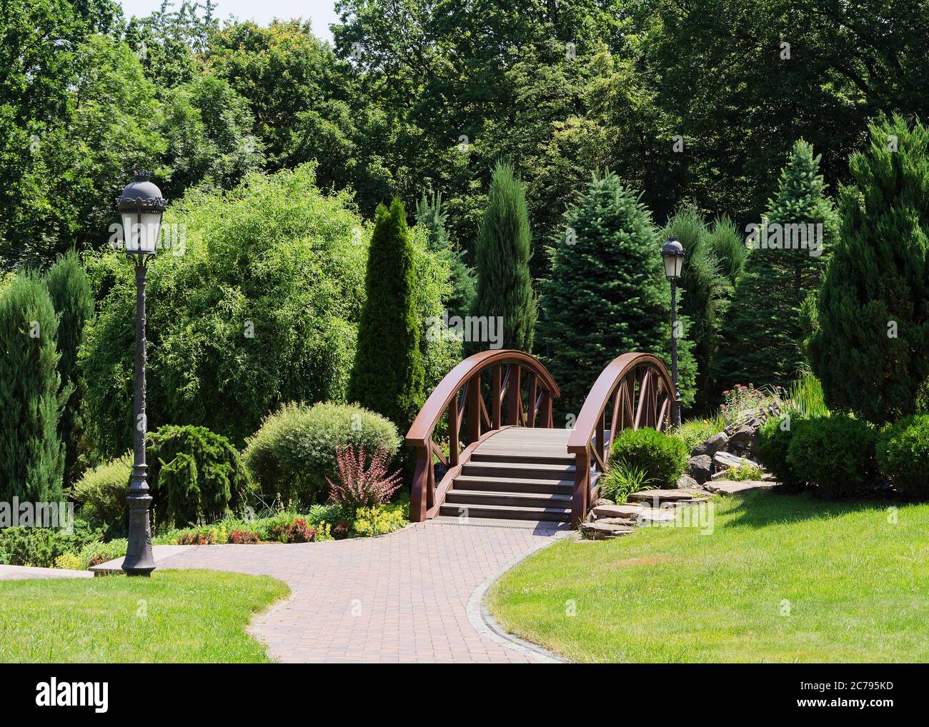 landscape design. Decorative bridge and plants Stock Photo - Alamy