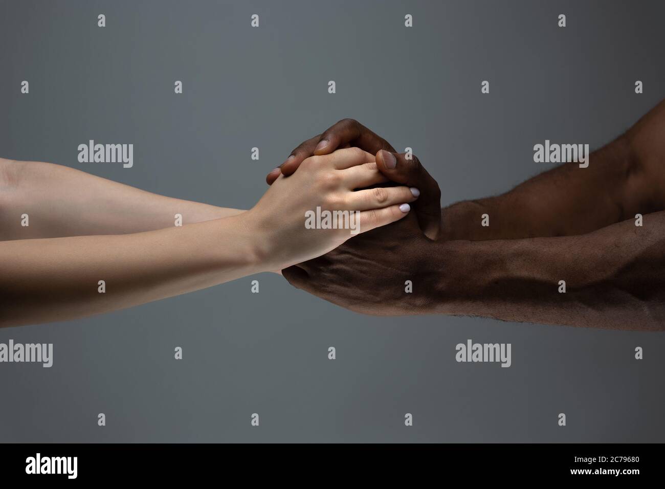 Supporting hands. Racial tolerance. Respect social unity. African and ...