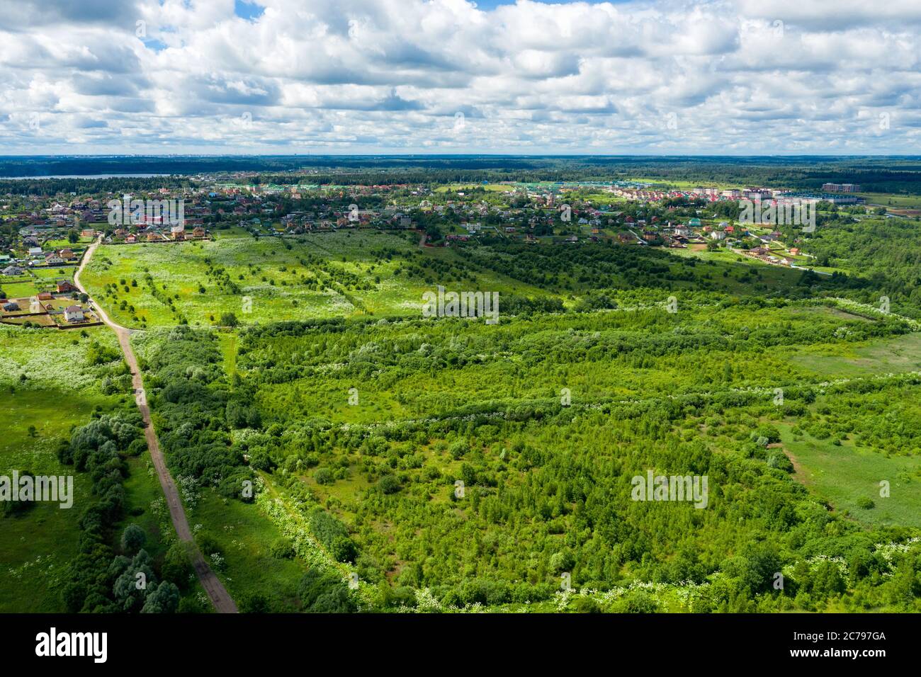 Aerial view of the countryside and village on the horizon Stock Photo ...