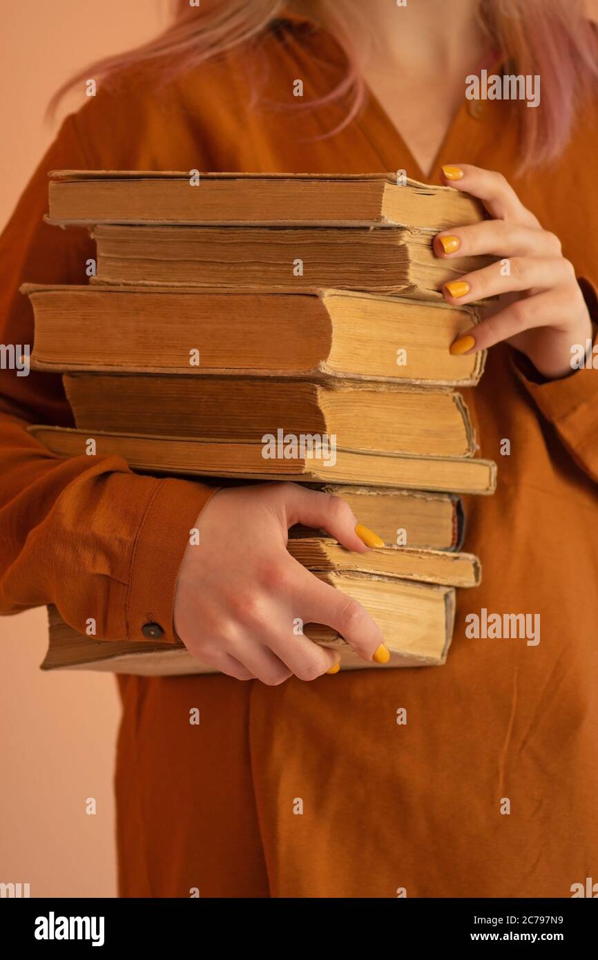 Girl Book Stack Pile Teenager High Resolution Stock Photography and ...