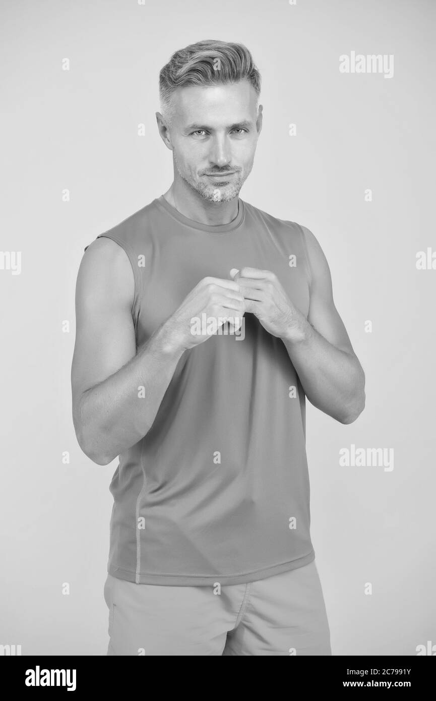 Turn fat into fit. Fit man blue background. Fit athlete in boxer ...