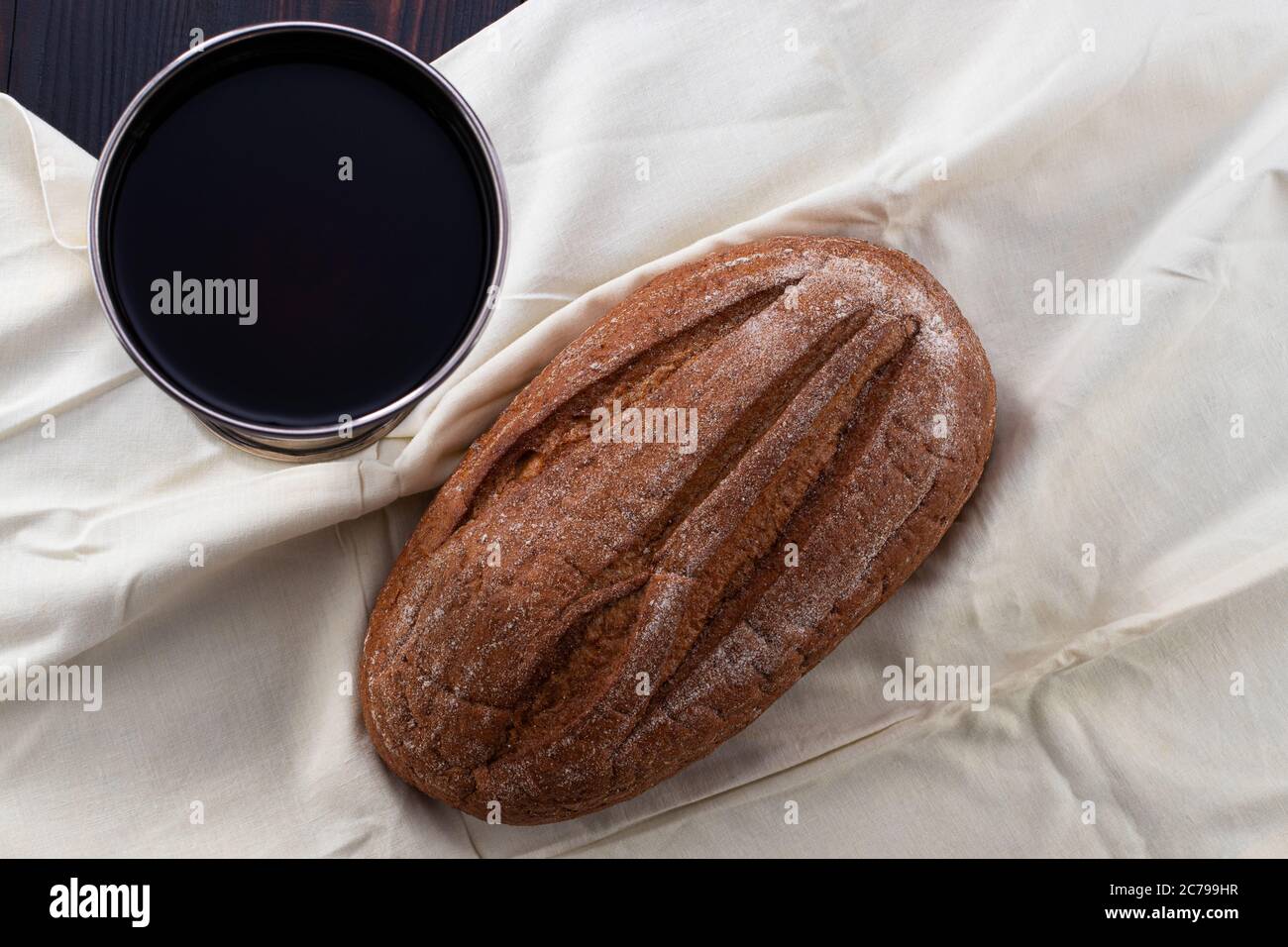 holy communion chalice with wine and bread Stock Photo - Alamy