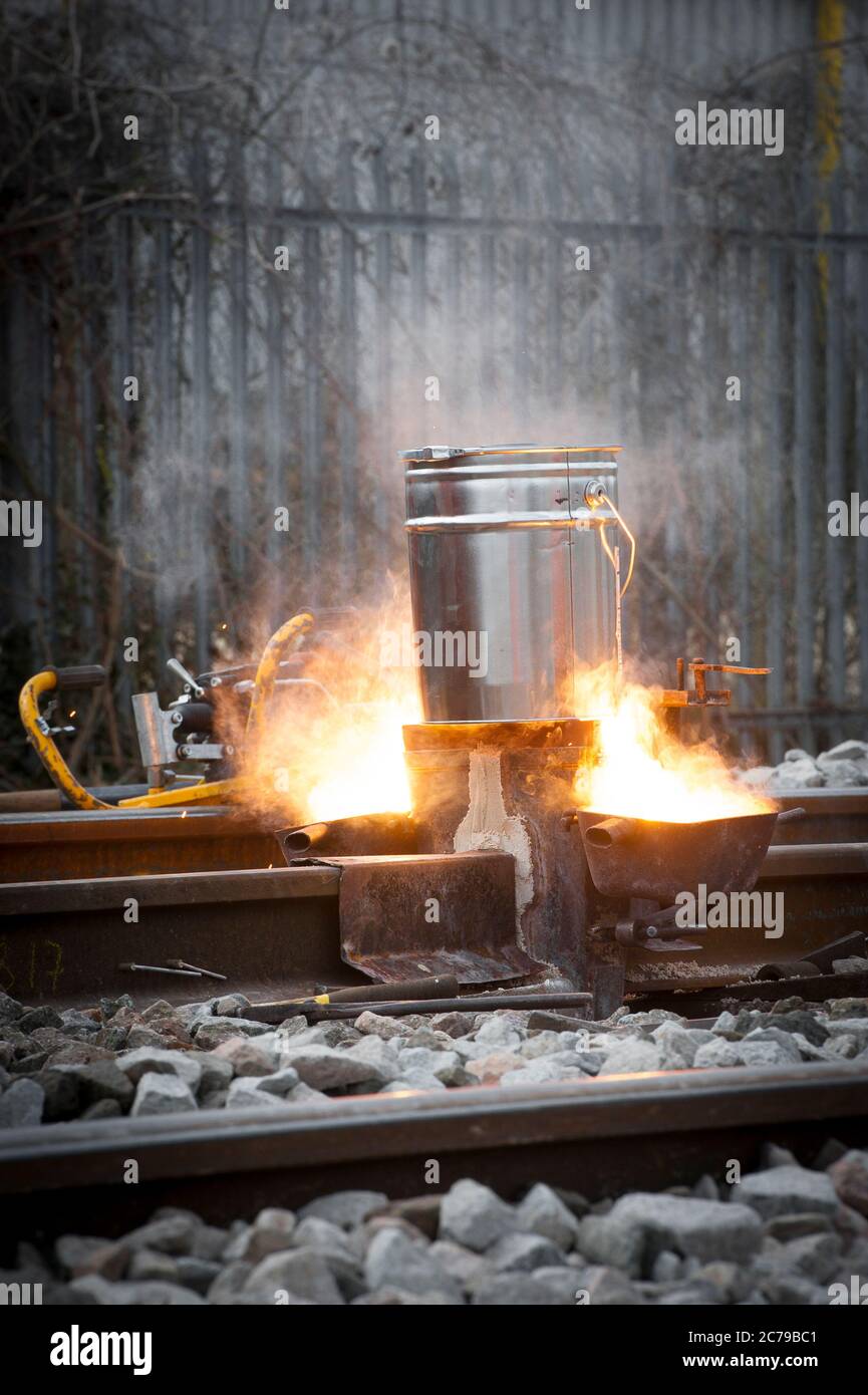 Thermit welding on rail track in the UK Stock Photo - Alamy