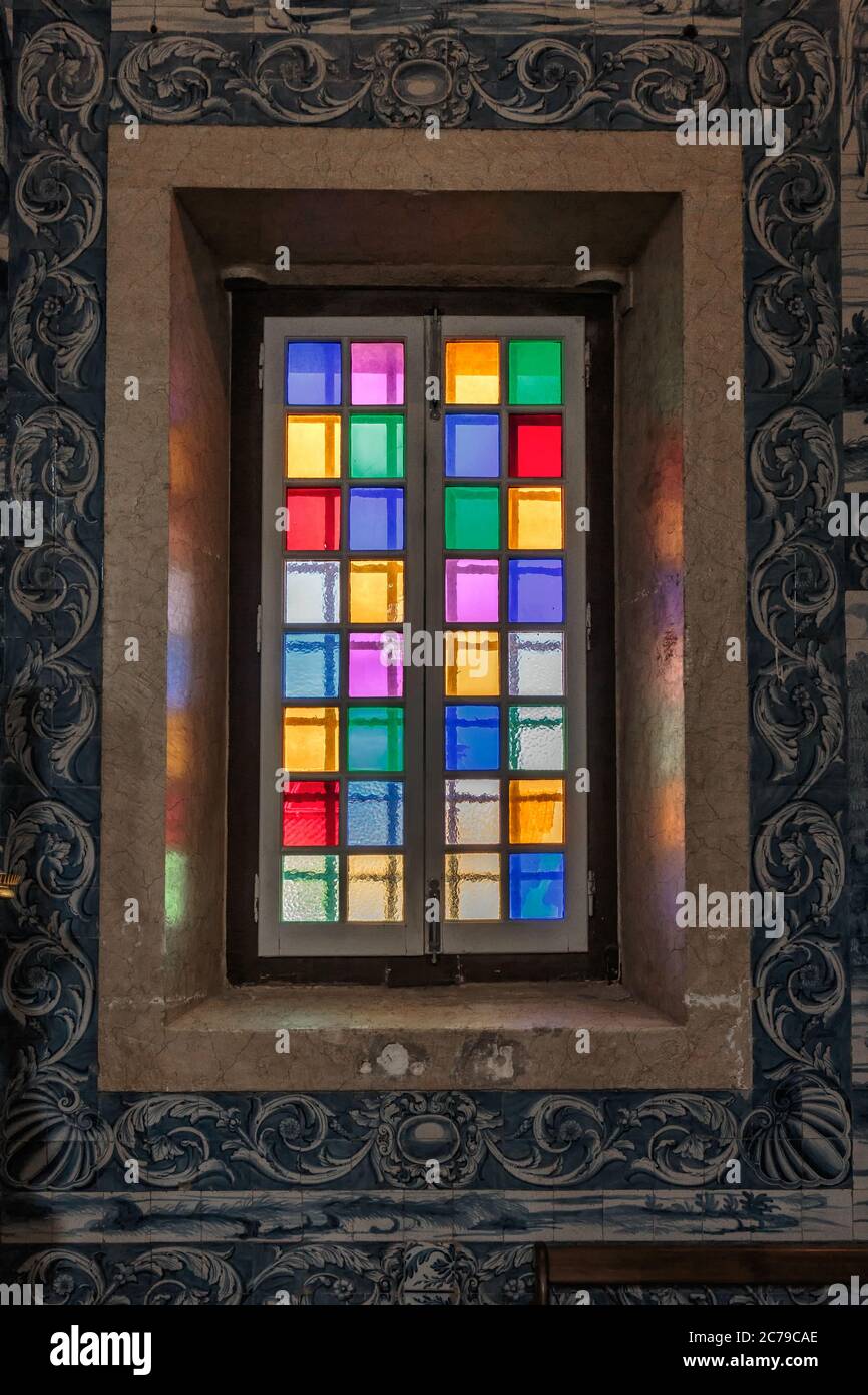 Colorful wooden window in the facade of a typical Portuguese house at ...