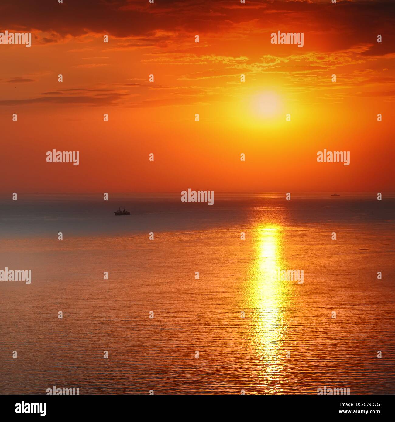 Panoramic dramatic sunset sky over sea at dusk. Ship in the sea Stock ...