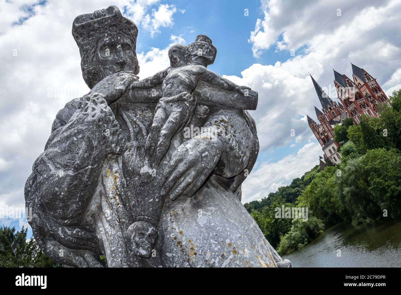 Statue of St. John of Nepomuk on Old Lahn Bridge over river Lahn, in ...