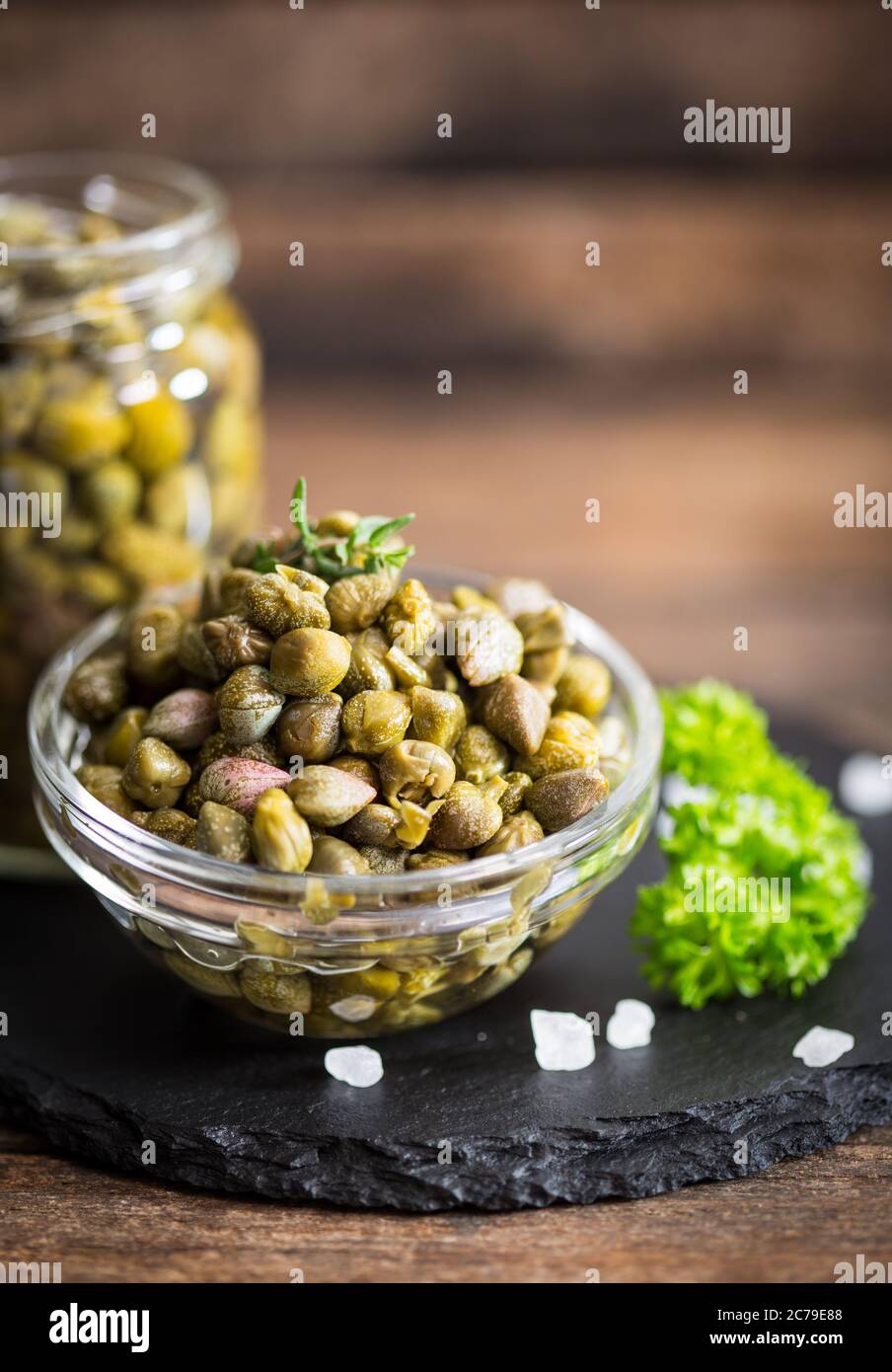 Fresh caper in the glass bowl Stock Photo - Alamy