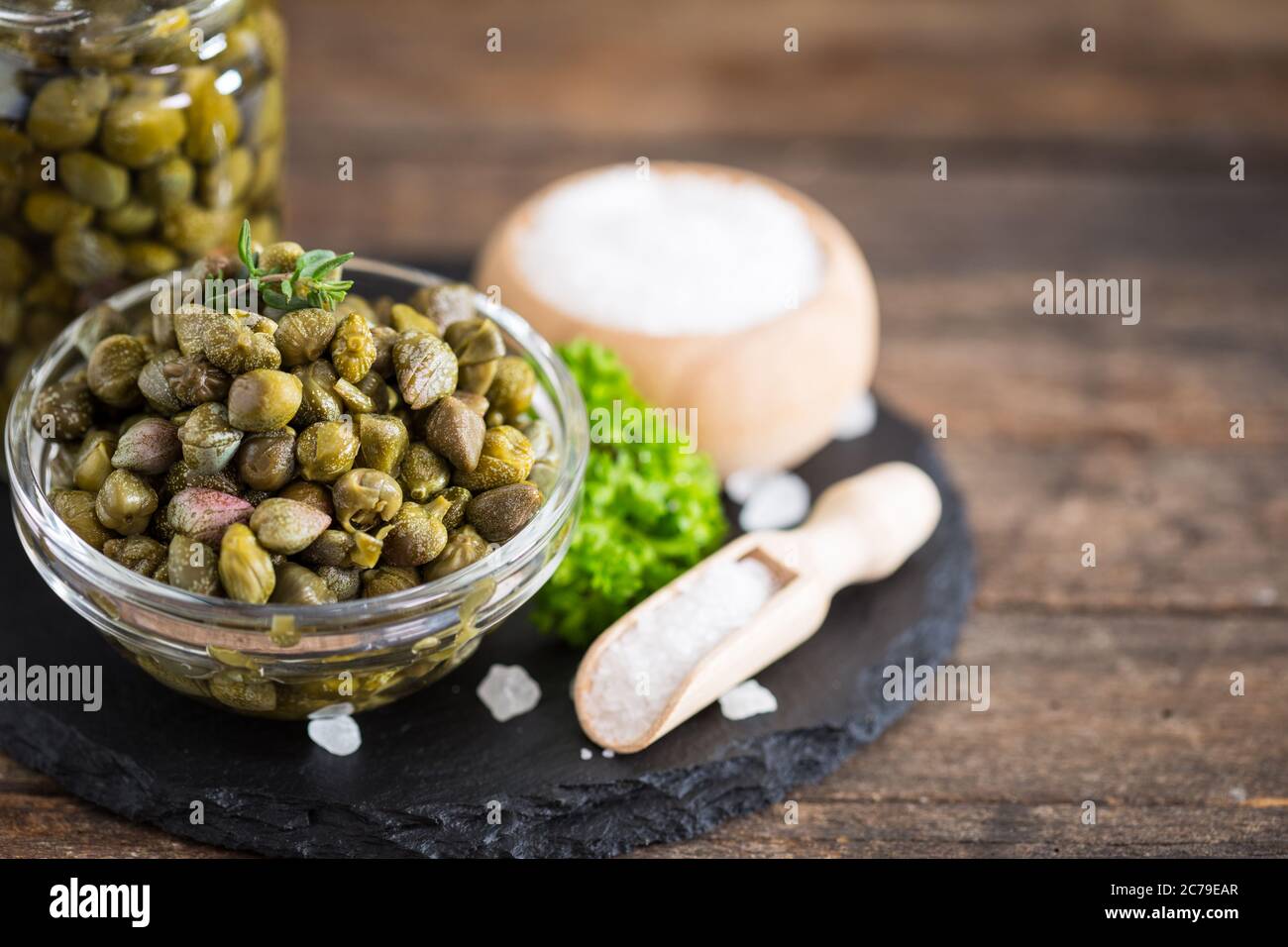 Fresh caper in the glass bowl Stock Photo - Alamy