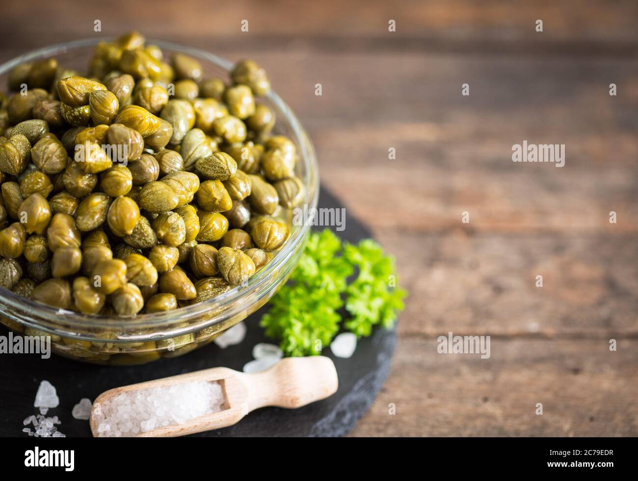 Fresh caper in the glass bowl Stock Photo - Alamy