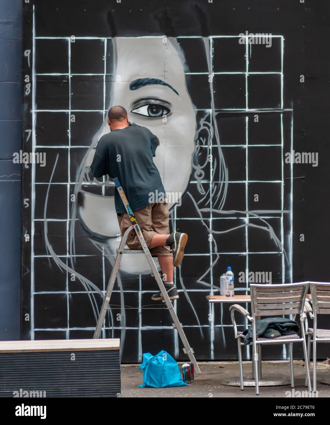Glasgow, Scotland, UK. 15th July, 2020. An artist at work on a new ...