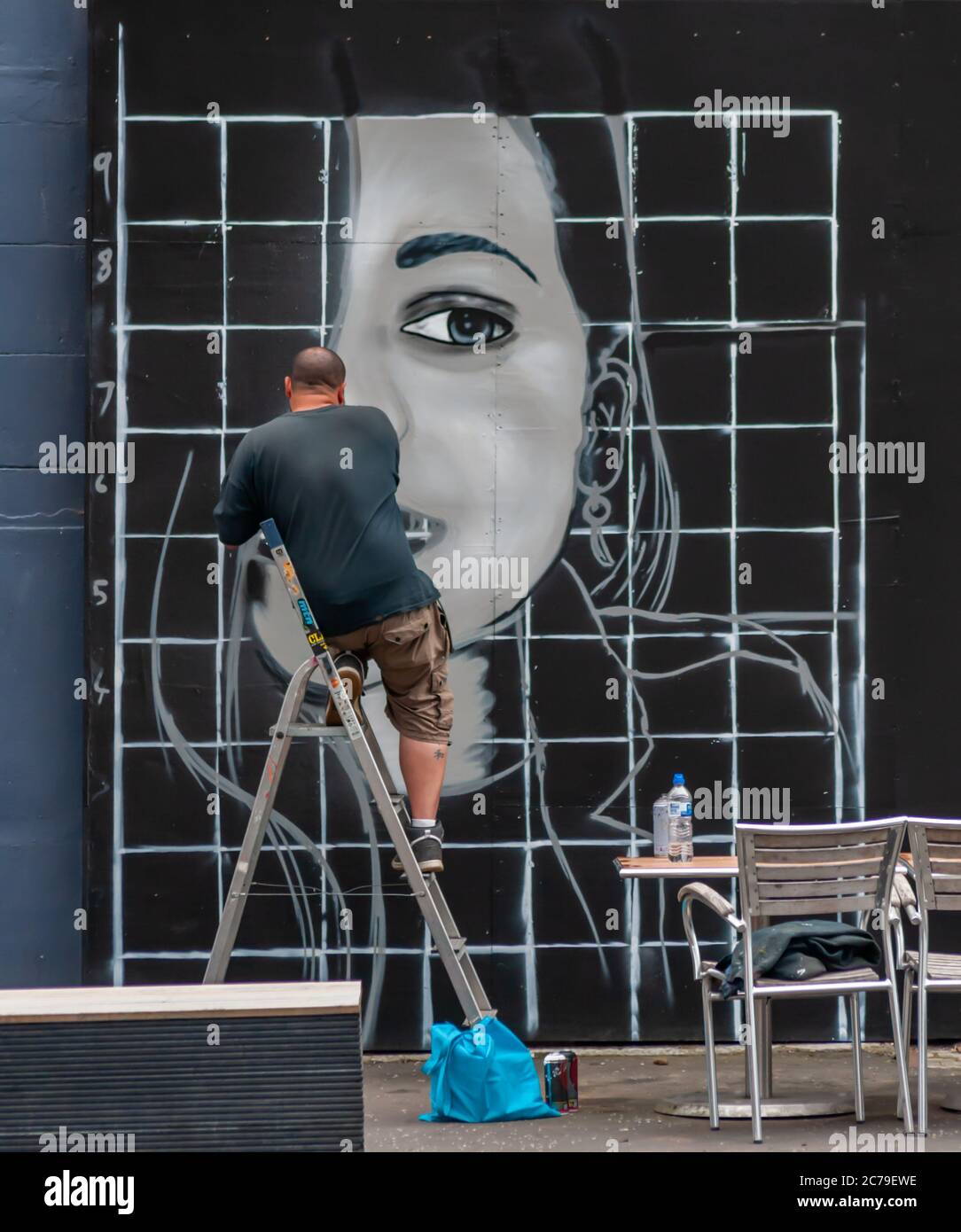 Glasgow, Scotland, UK. 15th July, 2020. An artist at work on a new ...