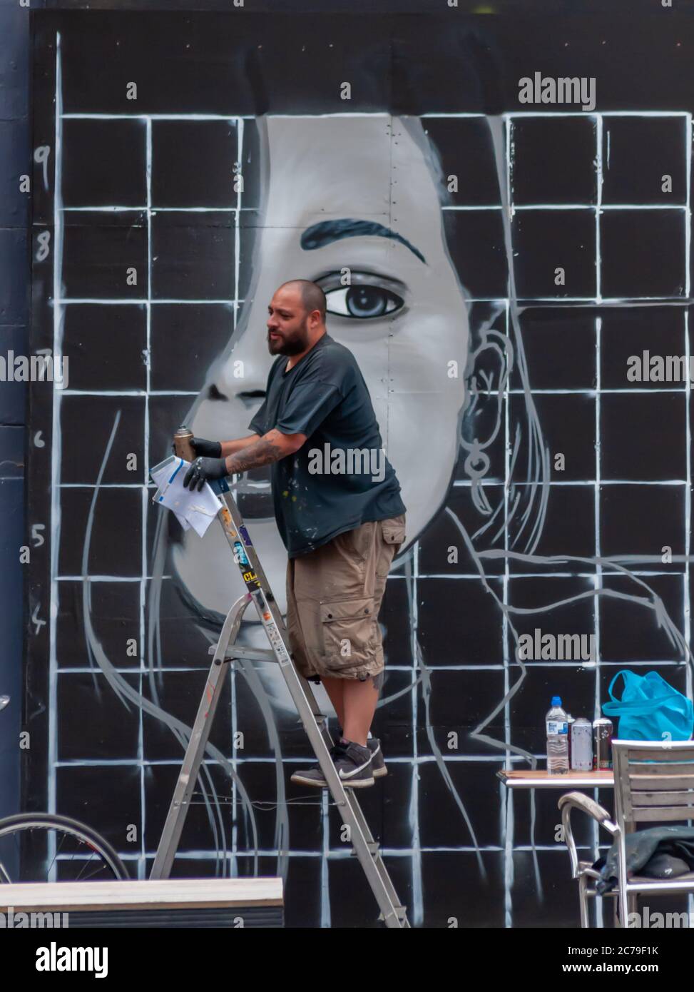 Glasgow, Scotland, UK. 15th July, 2020. An artist at work on a new ...
