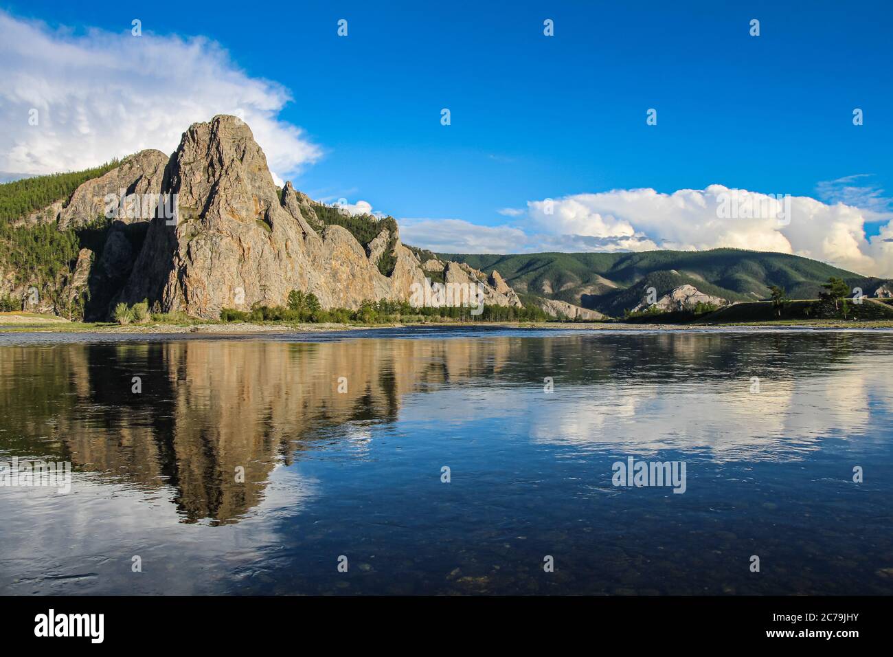 A mountain reflecting on the Delger Murun River in Mongolia, in the ...