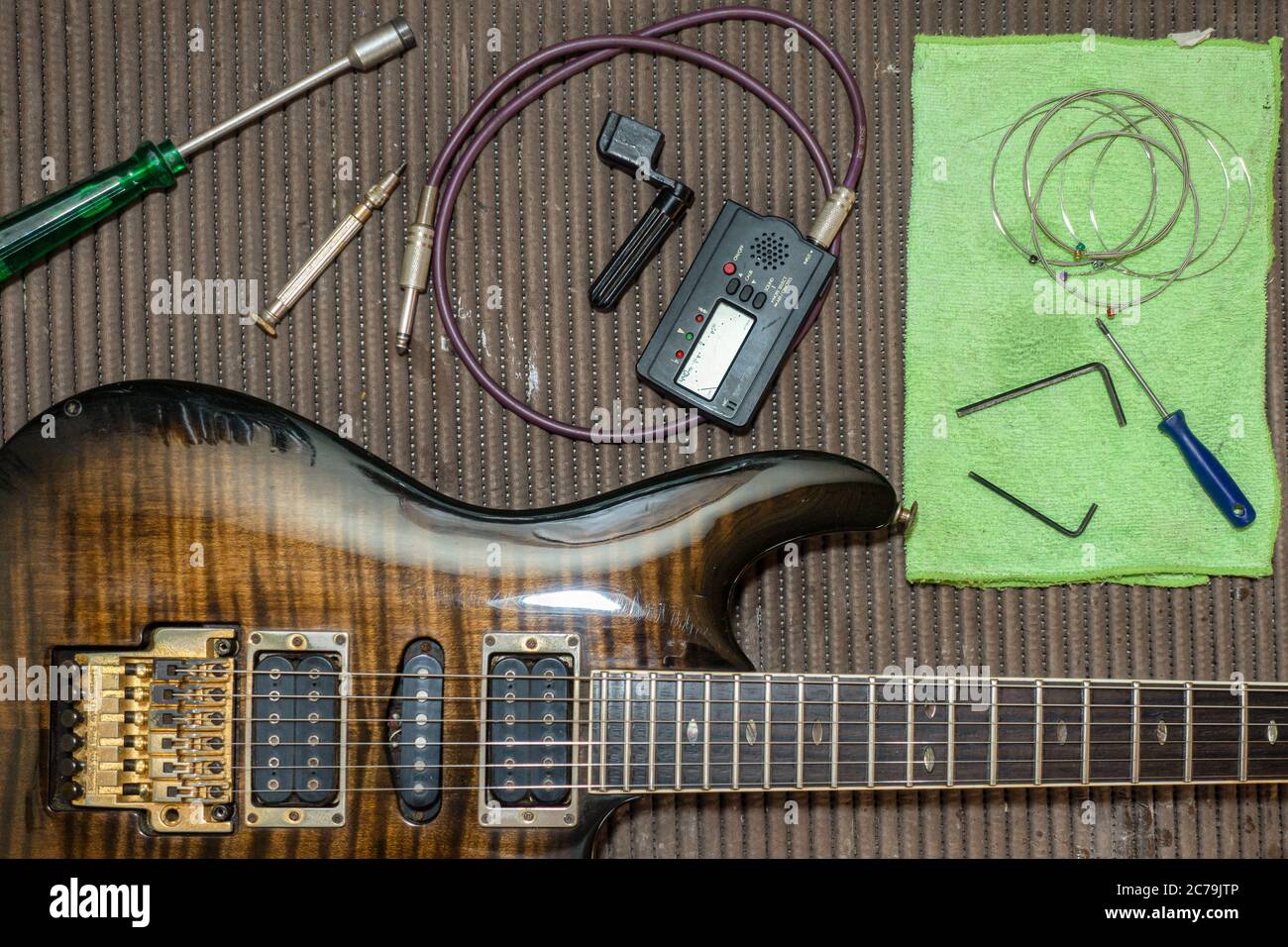 Luthier workbench with tools and an eletric guitar Stock Photo - Alamy