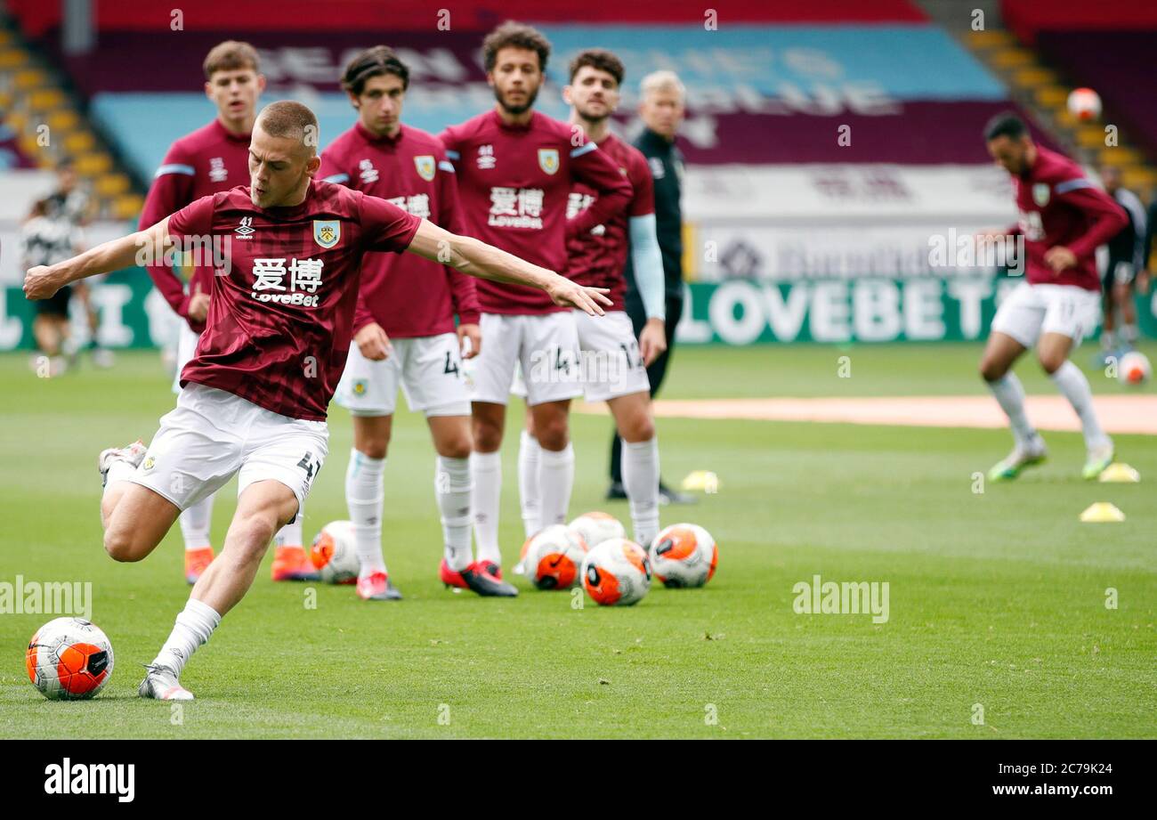 Burnley's Josh Benson (left) warming up before kick off during the ...