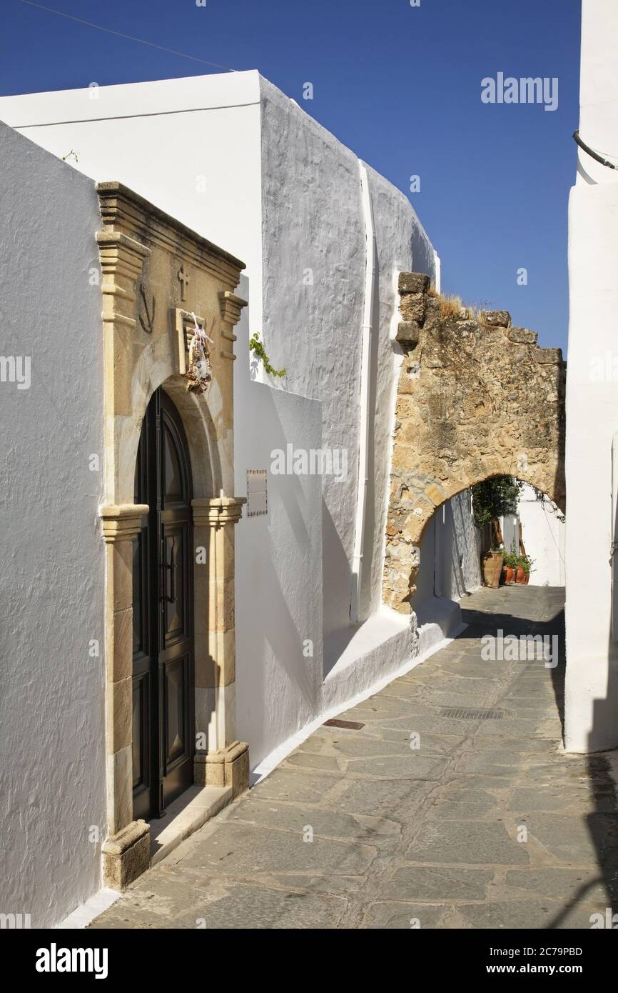 Old street in Lindos. Rhodes island. Greece Stock Photo - Alamy