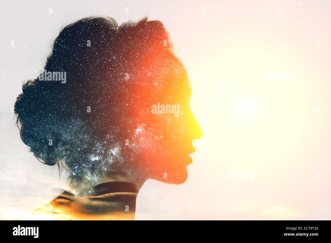 Dreamer girl with stars inside her head Stock Photo - Alamy