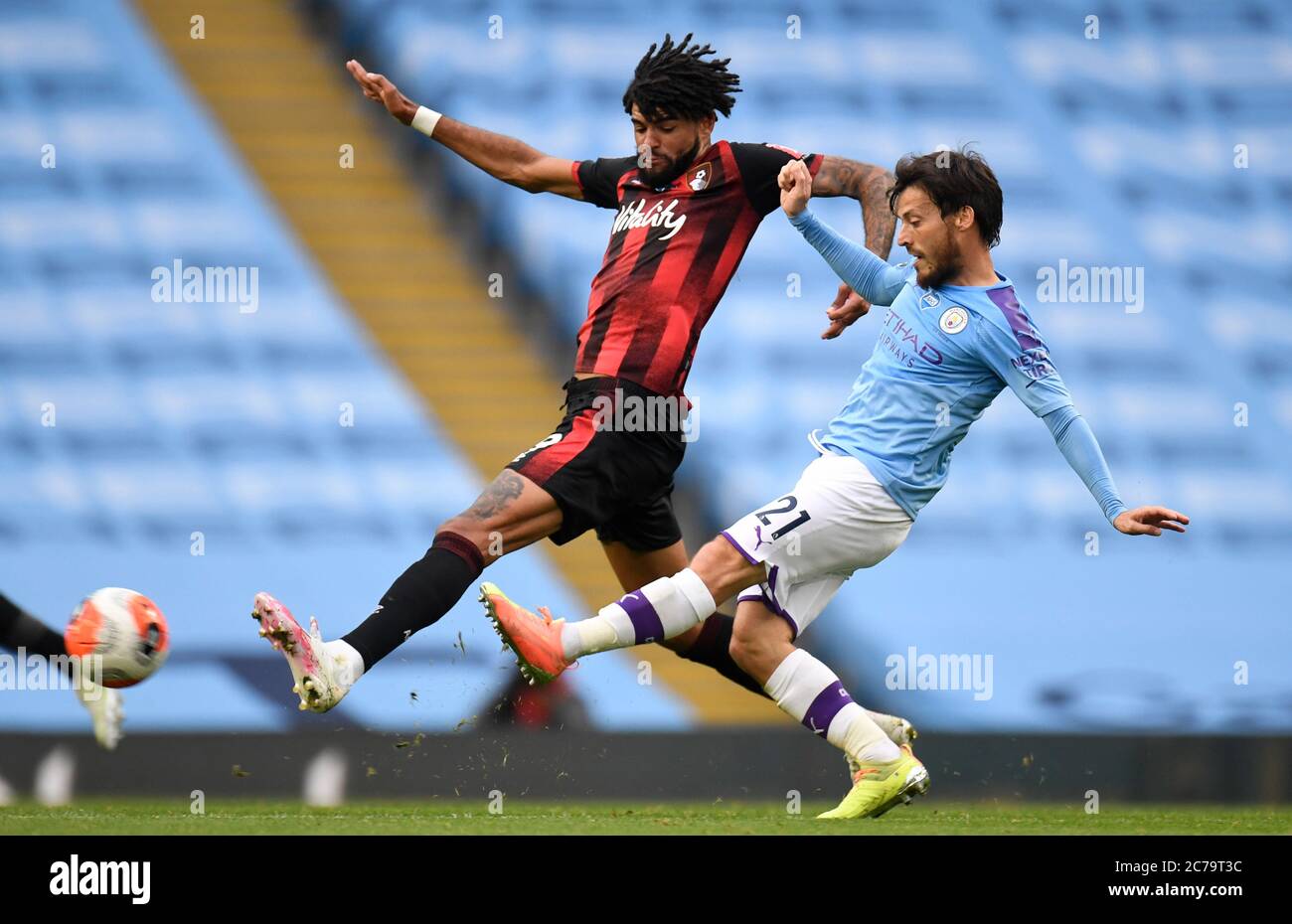 Bournemouth's Philip Billing (left) and Manchester City's David Silva ...