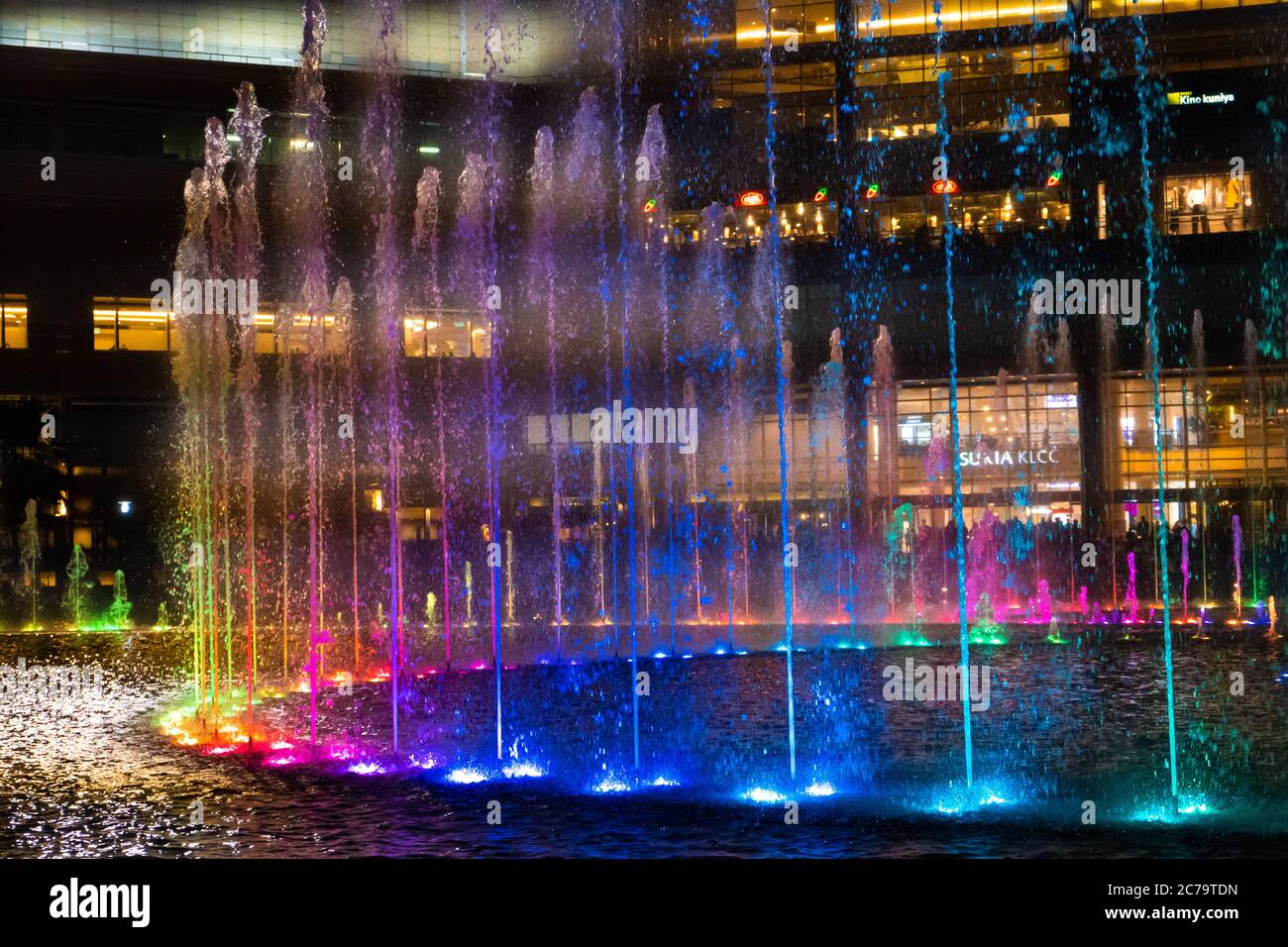 Night view of the dancing multi-colored fountains. Show of Singing ...