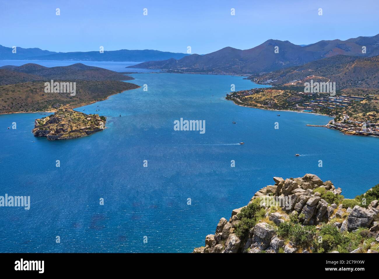 View of harbor between Spinalonga island and peninsula, known as ...