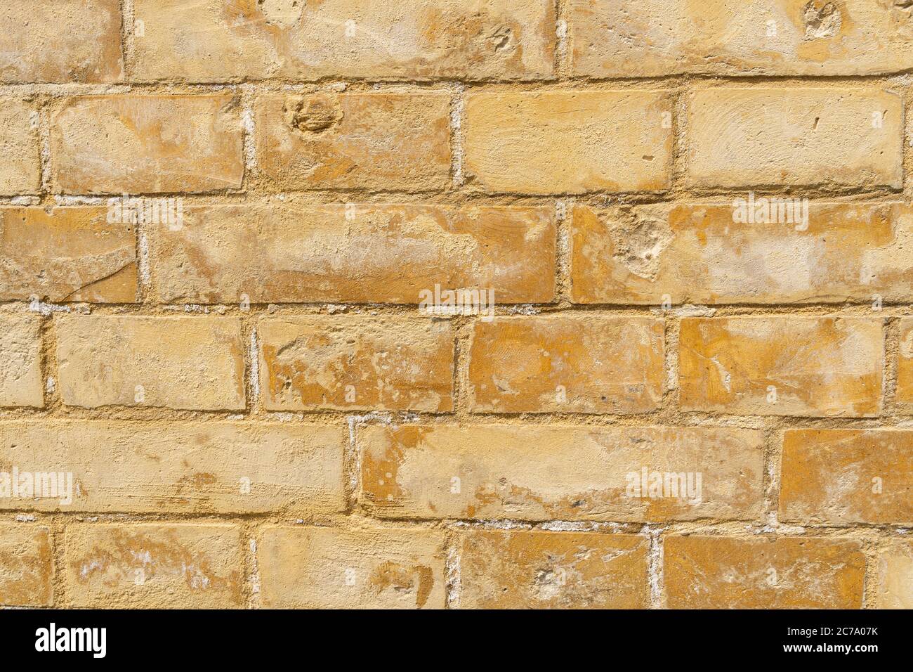 yellow brick background. stone texture for backgrounds Stock Photo - Alamy