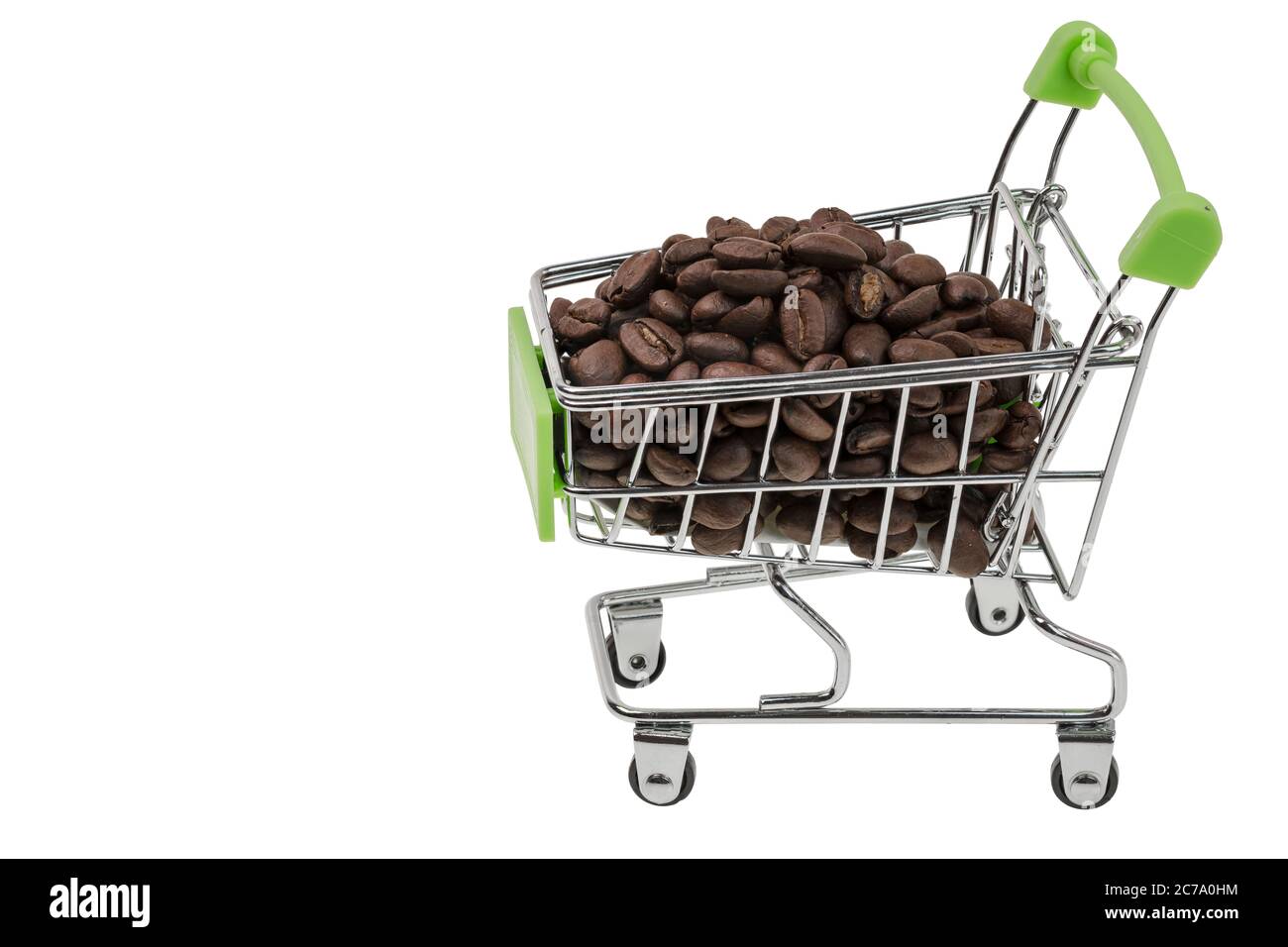 Close up view of shopping cart filled with coffee beans on white ...
