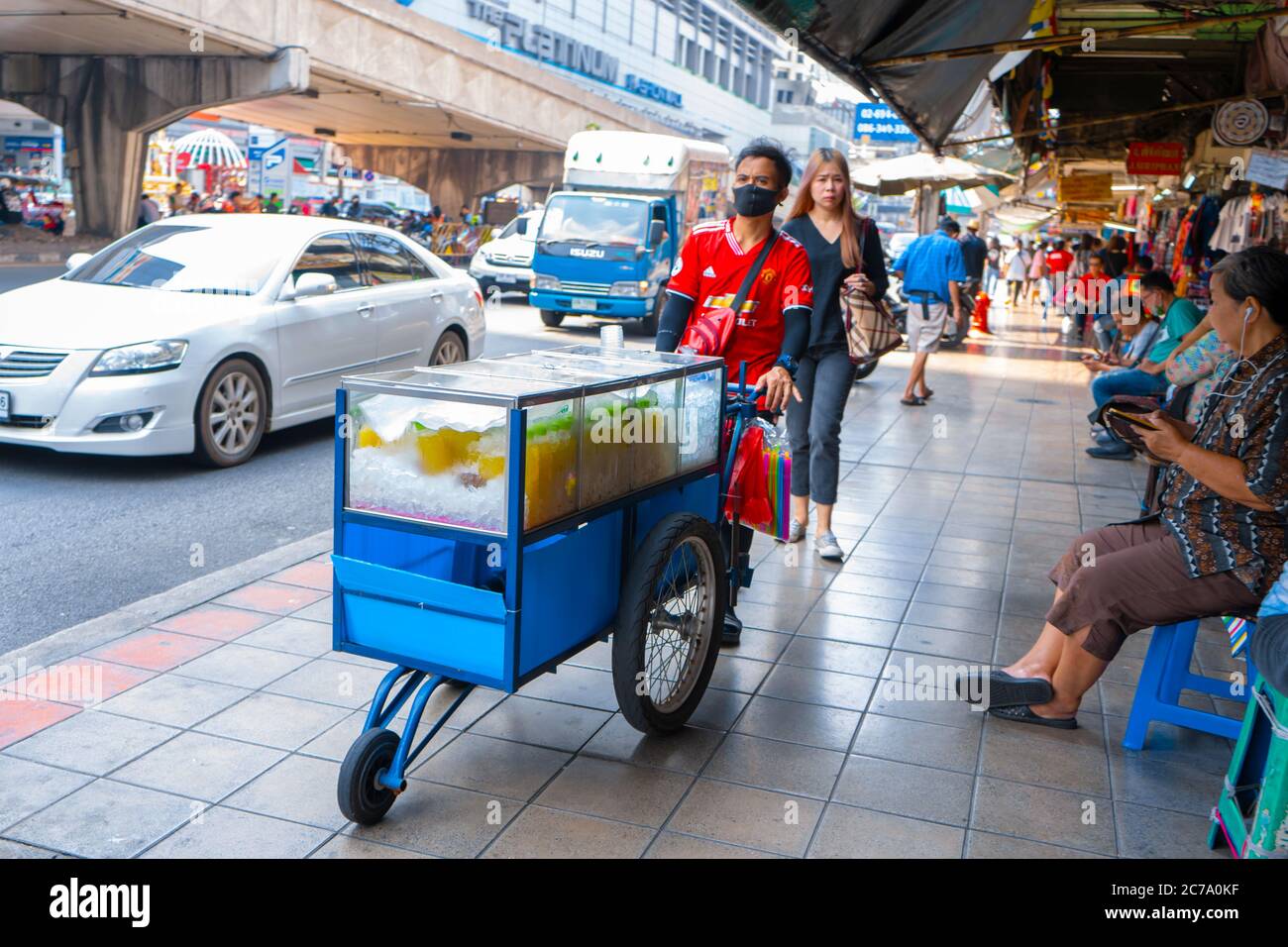 Street food seller in Asia. Mobile store food cart on wheels Stock ...