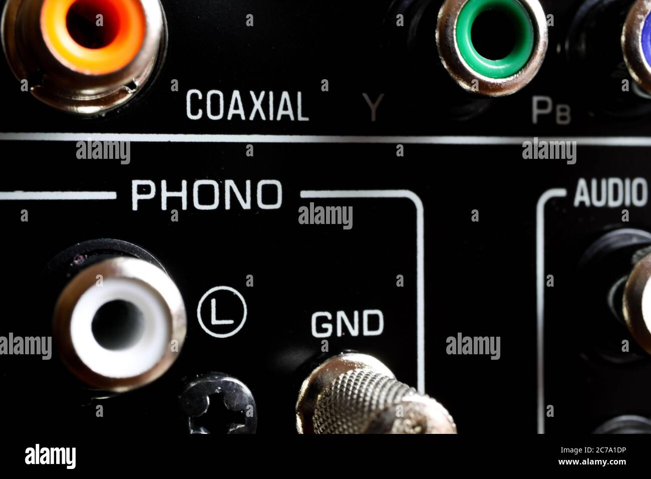 View on isolated cinch sockets of back side of black dolby surround ...