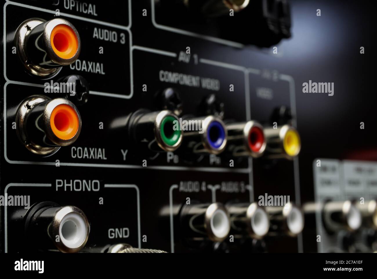 View on isolated cinch sockets of back side of black dolby surround ...