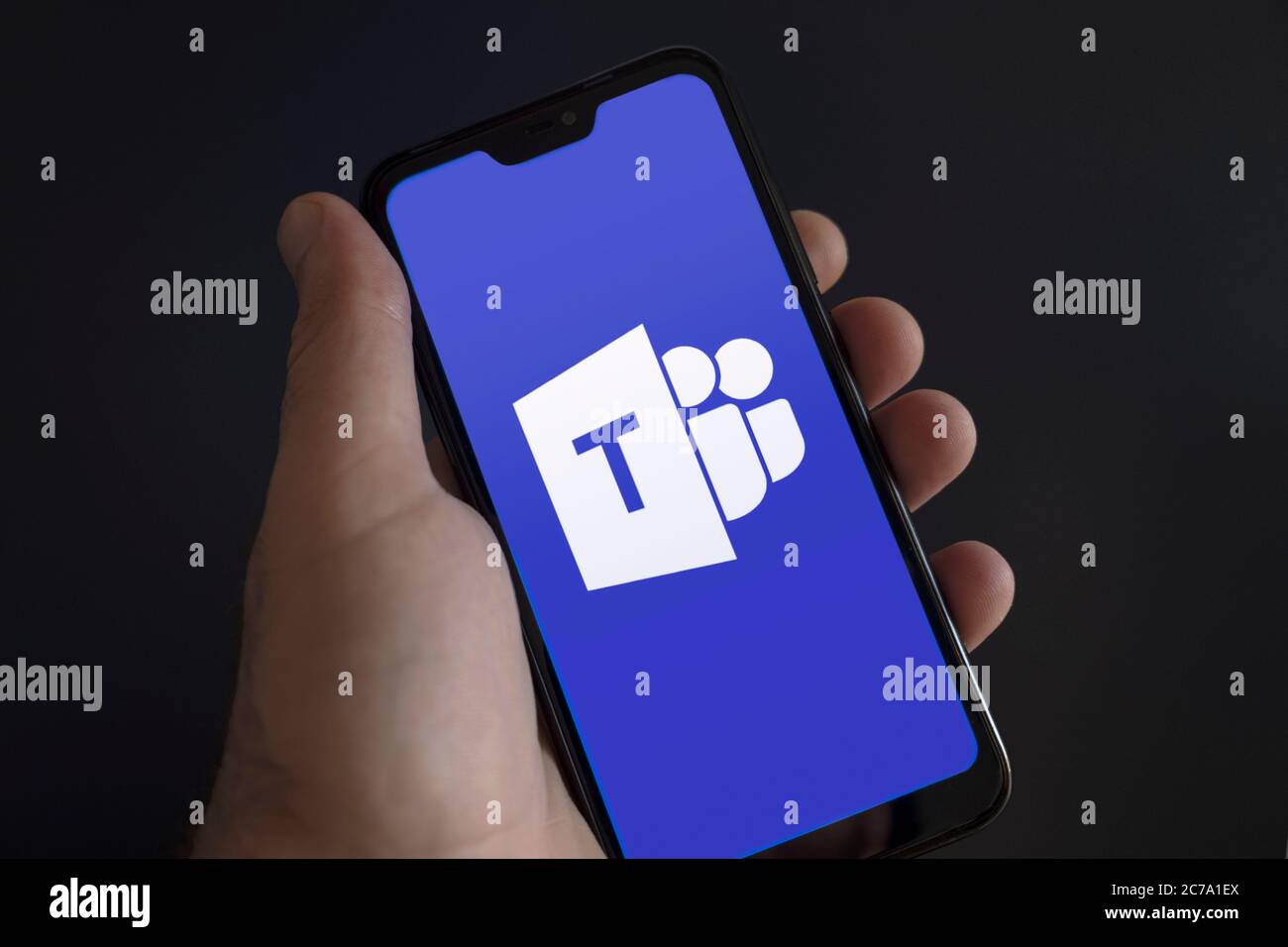 The screen of a smartphone with Microsoft Teams video conference app ...