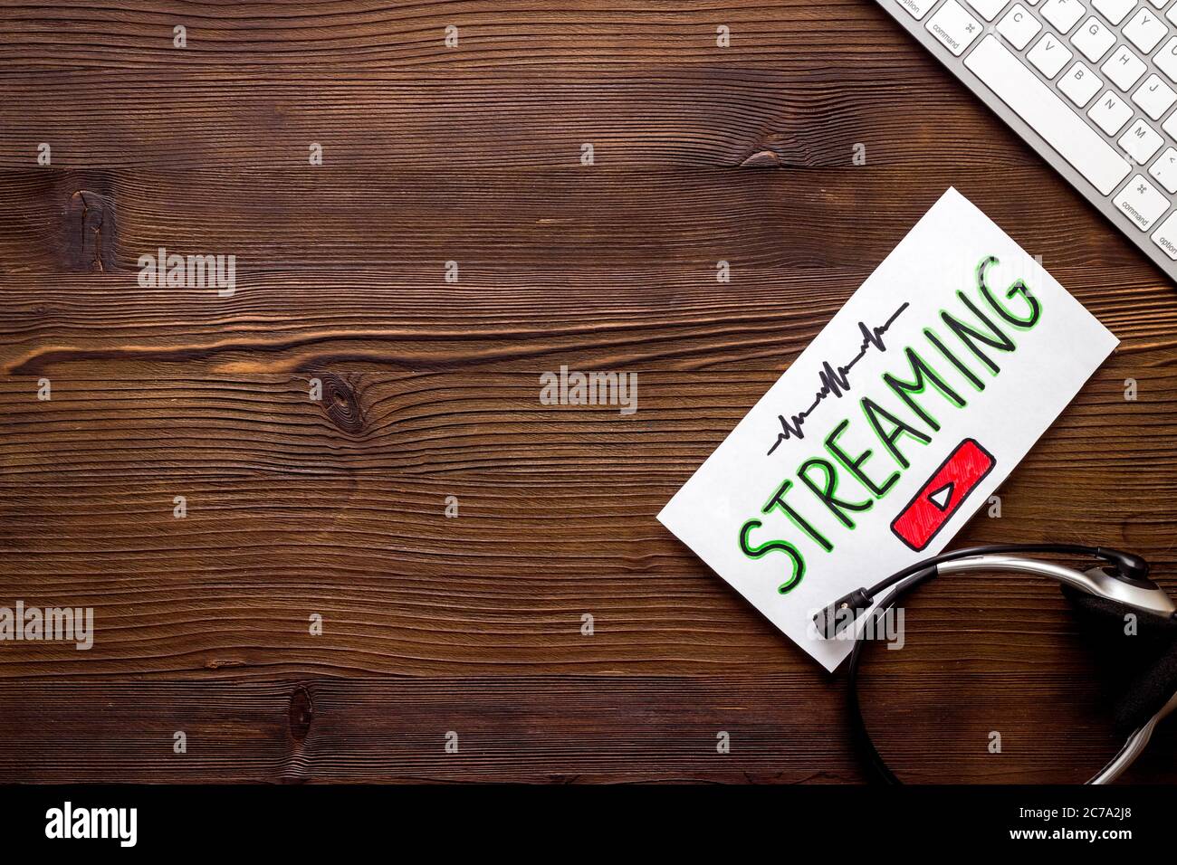 Online streaming social media concept. Paper tablet on office desk top ...