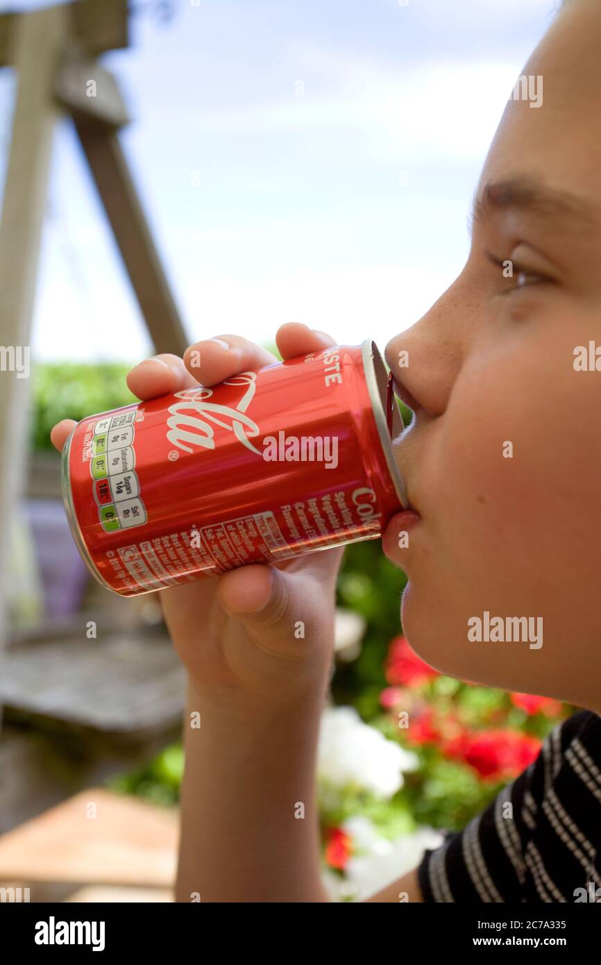 Girl Drinking Coca Cola High Resolution Stock Photography and Images ...