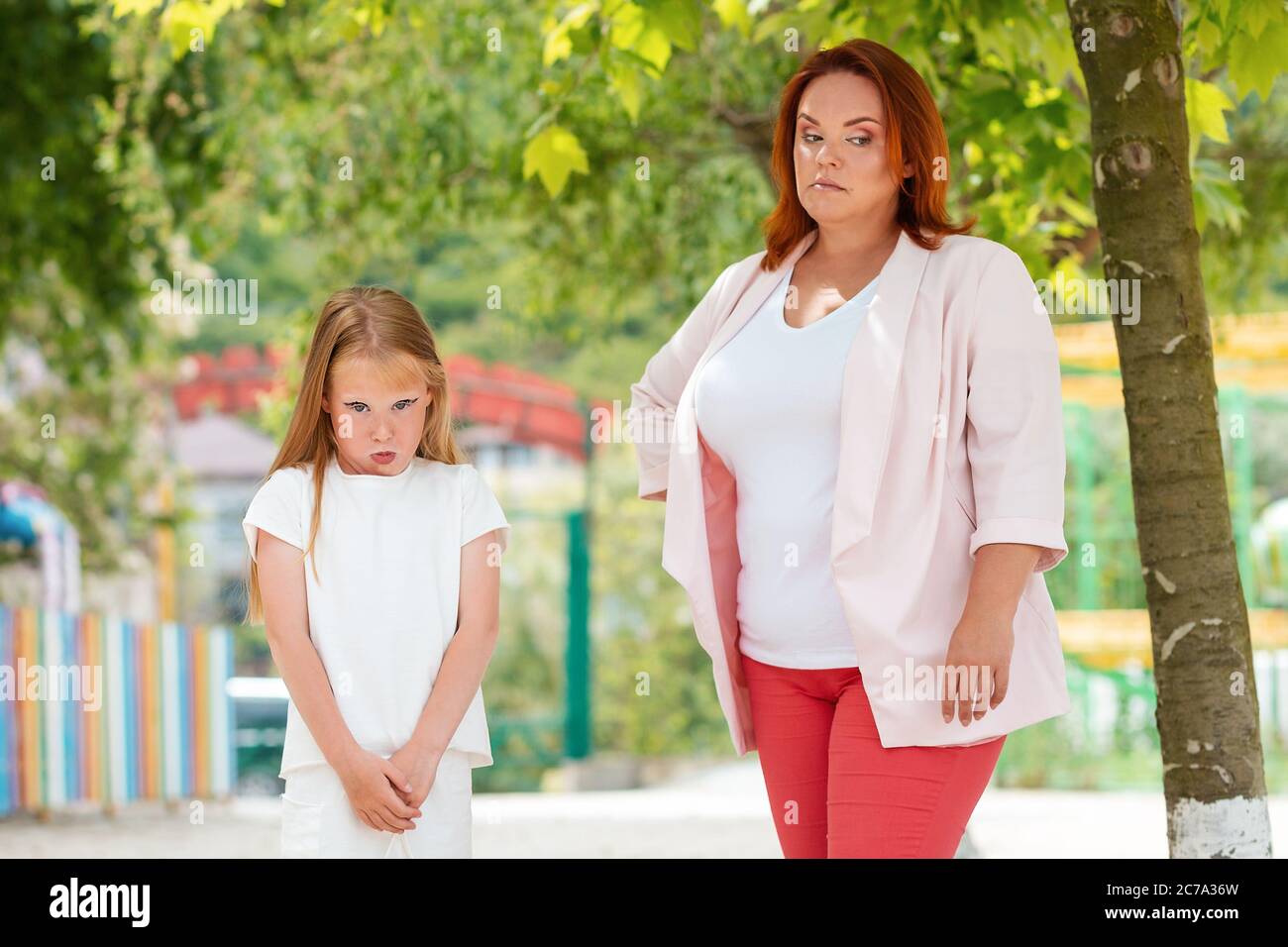 Family. Portrait of a distressed mother and daughter, quarreling in the ...