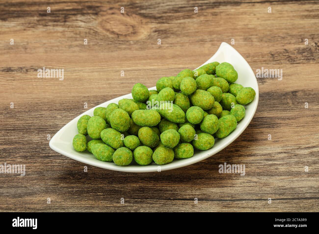 Spicy wasabi peanuts snack in the bowl Stock Photo - Alamy
