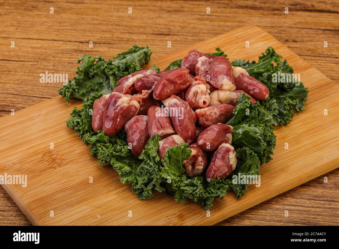 Raw chicken hearts heap for cooking Stock Photo - Alamy