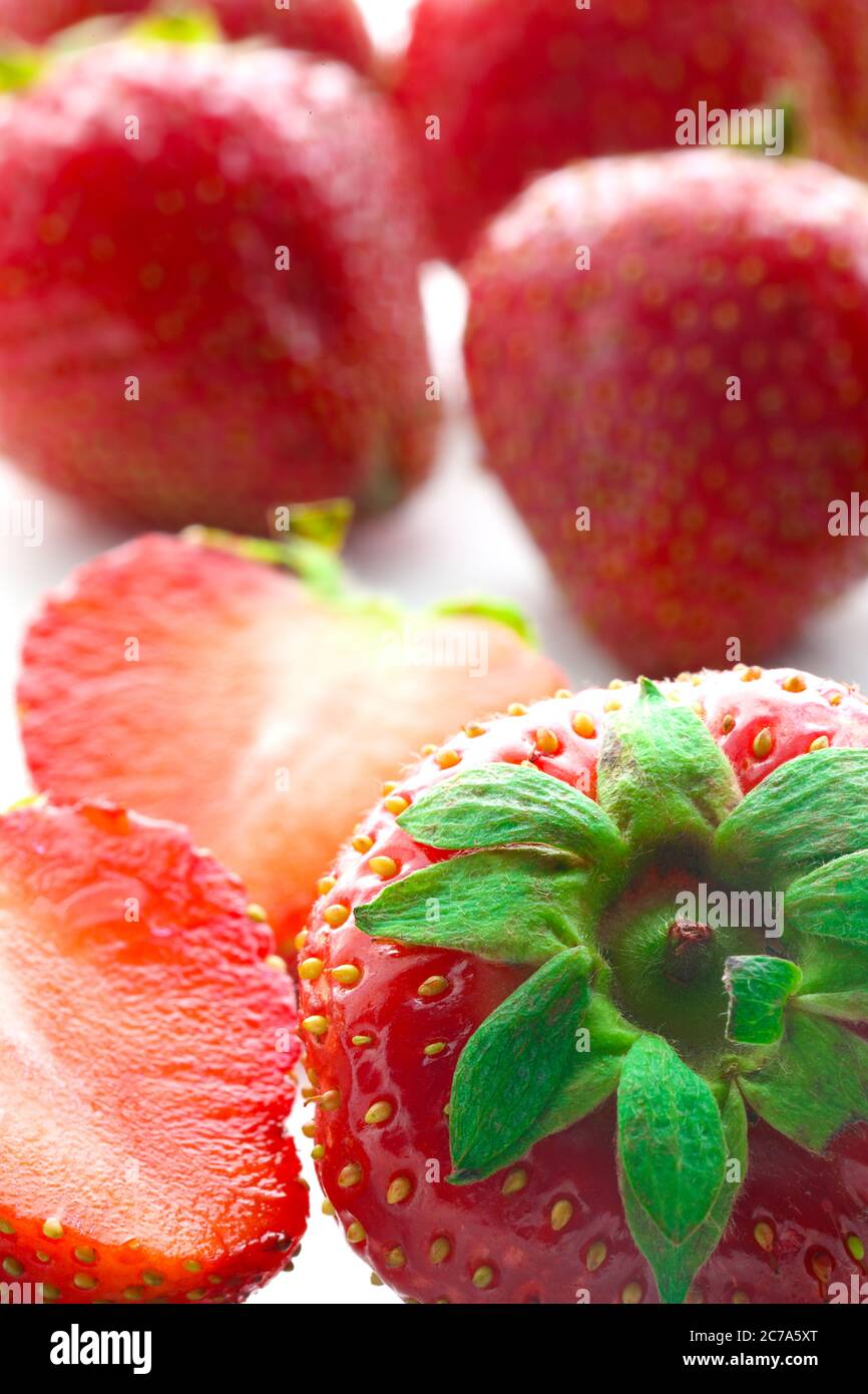 Red berry strawberry isolated on white background. Slices of strawberry ...