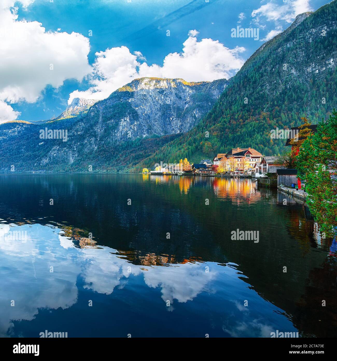 Scenic view of famous Hallstatt mountain village with Hallstatter lake ...