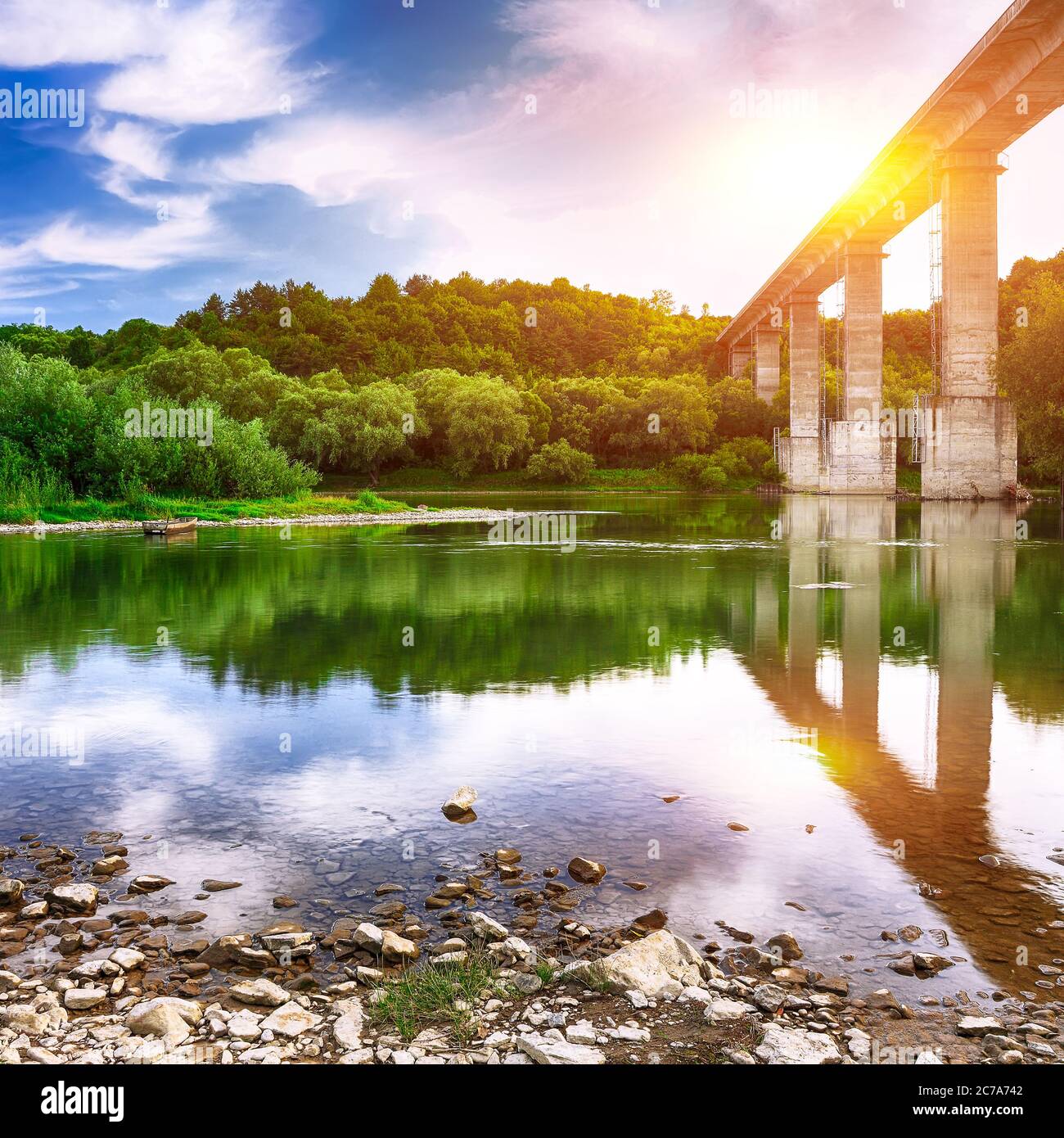 Huge arch bridge built over Dnister river in Ukraine. Beautiful clouds ...