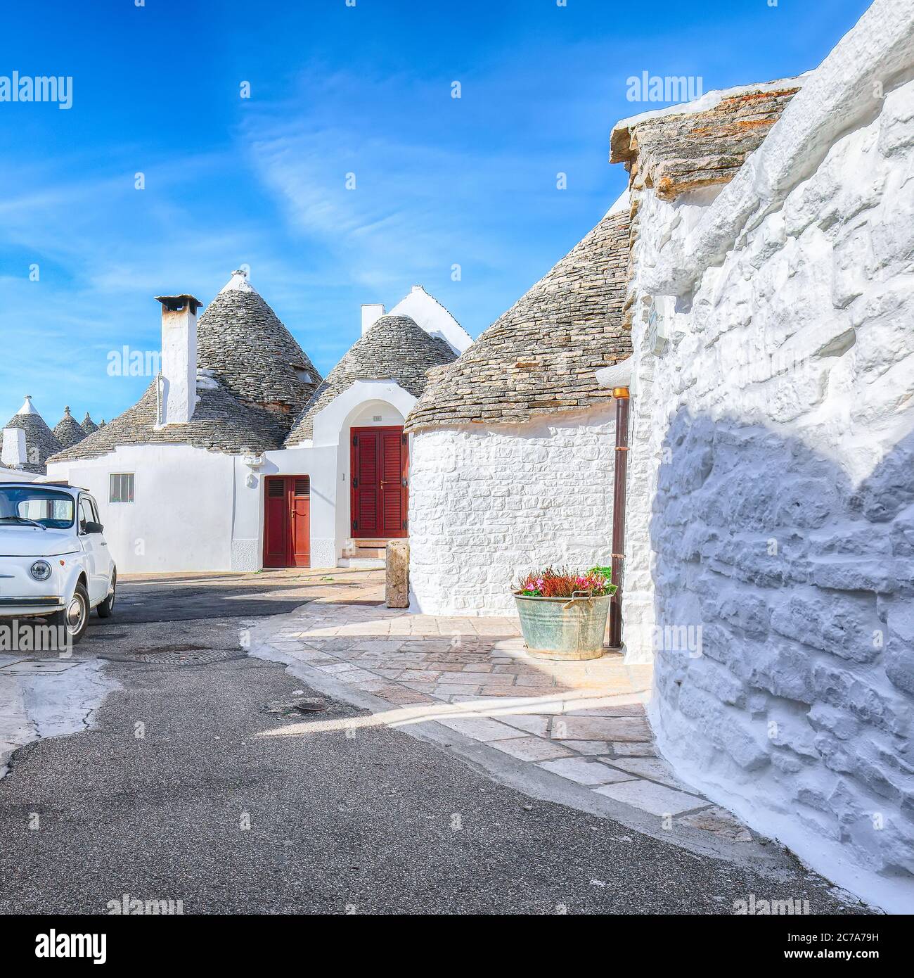 Trulli of Alberobello typical houses street view. Town of Alberobello ...