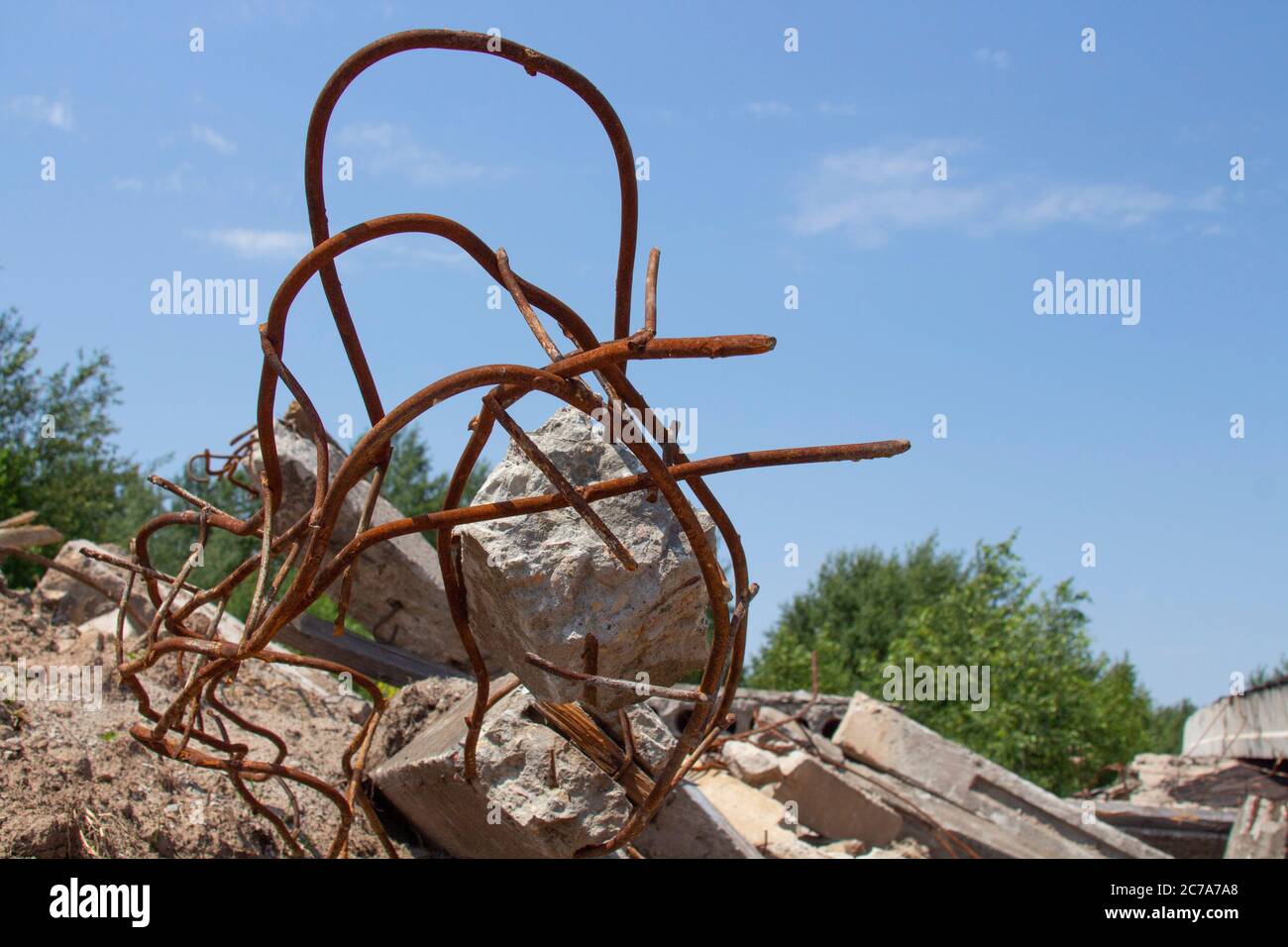Pieces of concrete and iron reinforcement outdoors Stock Photo - Alamy