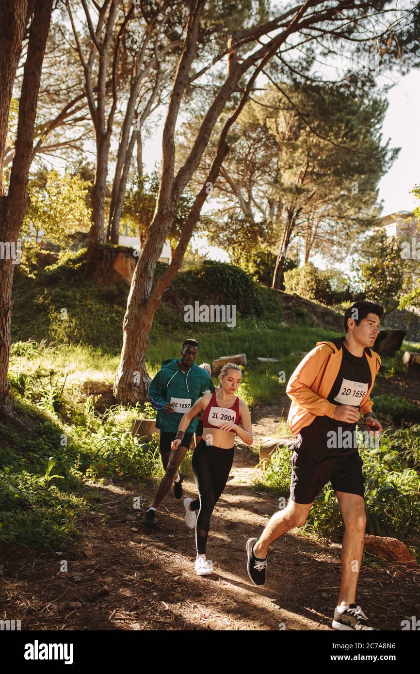 Group people running down hill hi-res stock photography and images - Alamy