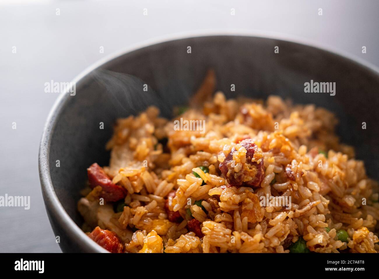 Fried rice with turkey and chorizo Stock Photo - Alamy