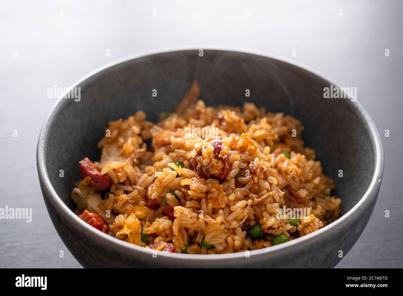 Fried rice with turkey and chorizo Stock Photo - Alamy