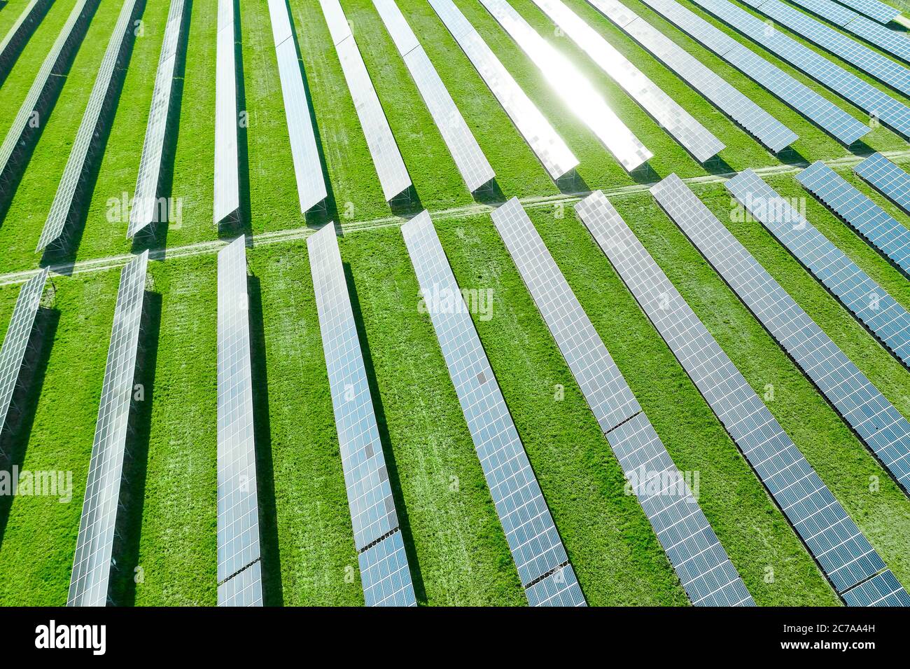 Aerial view of solar power station. Photovoltaic panels field for ...