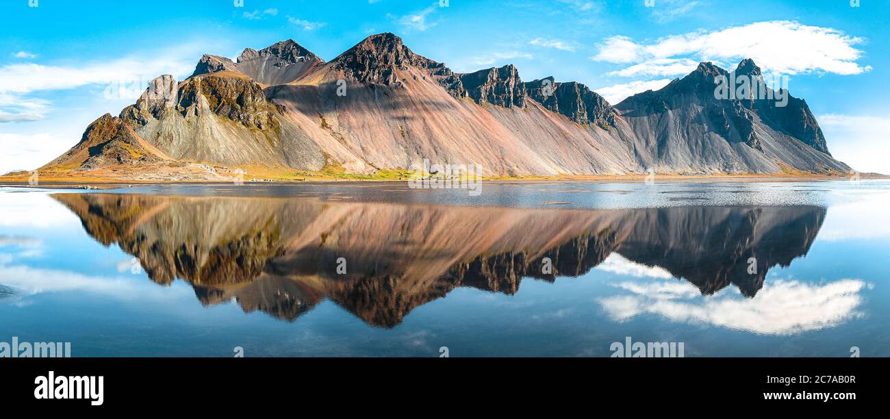Splendid sunny day and gorgeous reflection of Vestrahorn mountaine on ...
